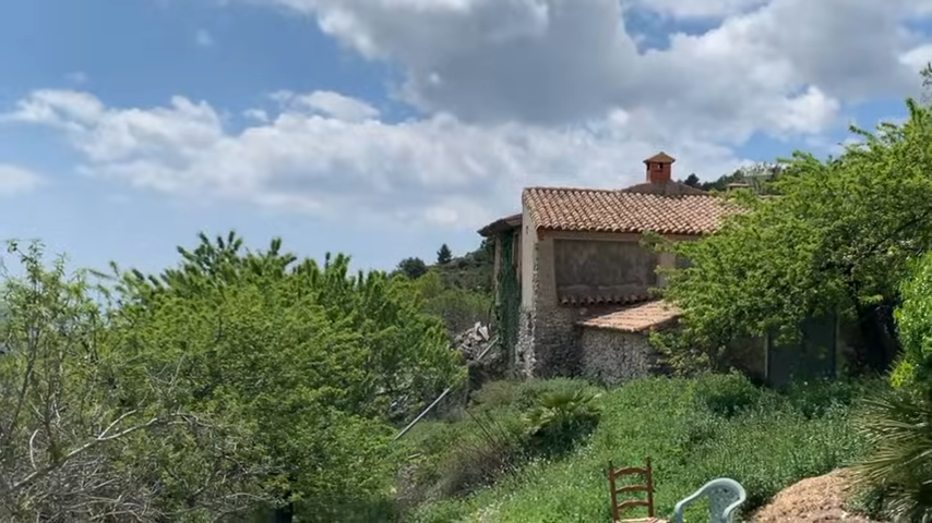 Young family restores stone house in mountain wilderness