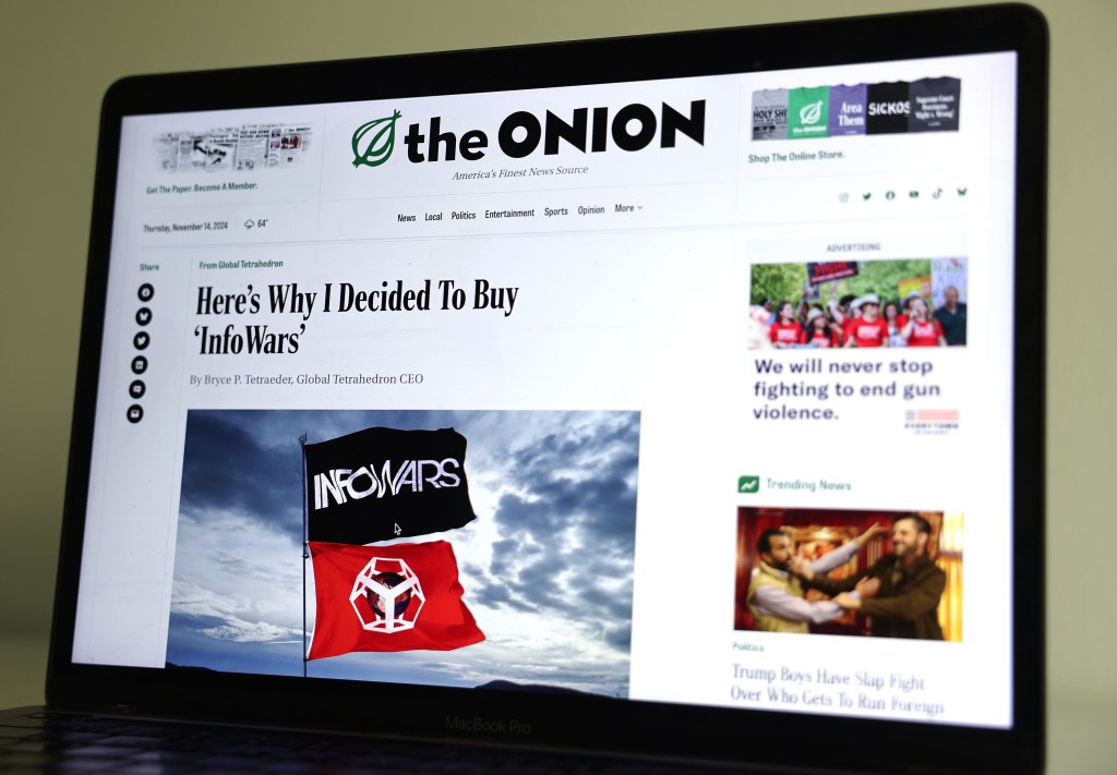 Shirtless Alex Jones reacts to The Onion-Infowars deal