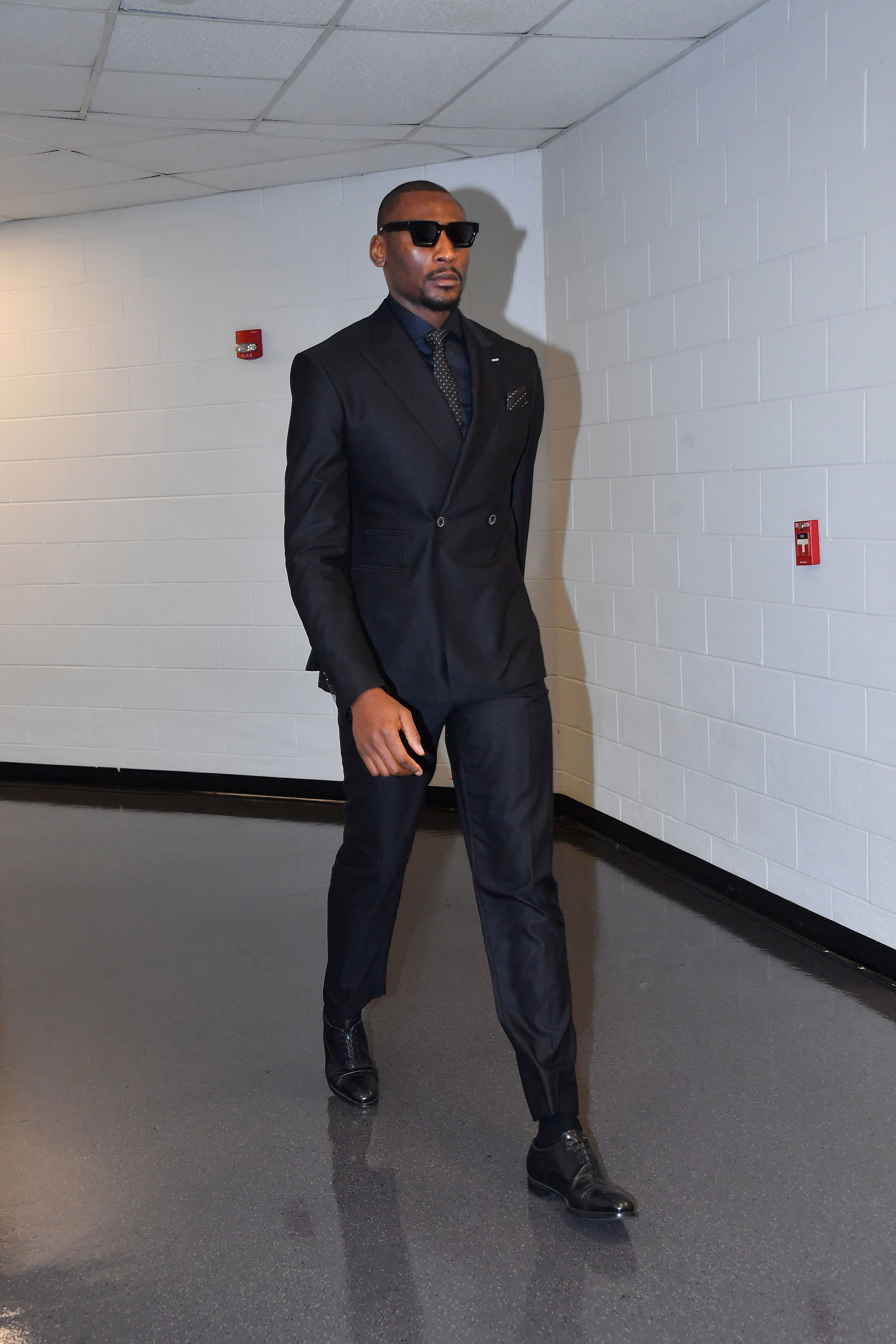 The San Antonio Spurs kicked off their playoff run in matching black suits