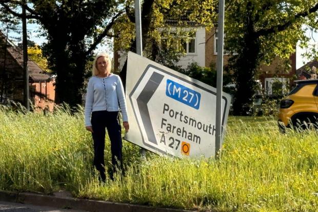 Councillor 'fed up' with road sign 'mess' at entrance of town