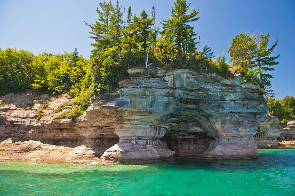 Michigan’s painted cliffs bleed red and orange 200 feet above Lake Superior