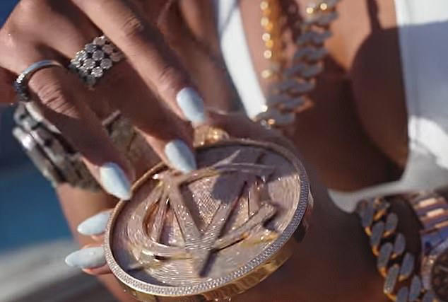 On-the-run rapper exposed as drug trafficker after his gold chain ...