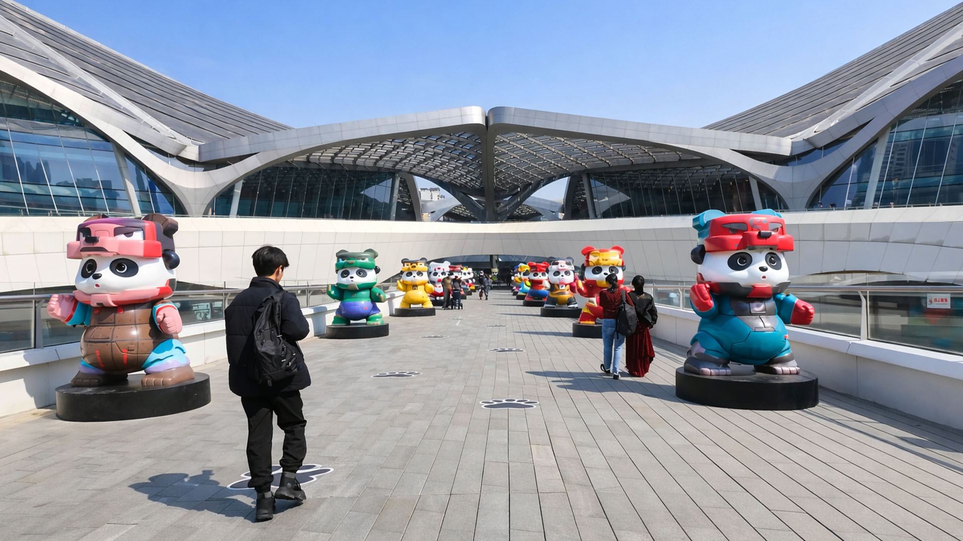 A unique space where panda figures lead into a massive structure