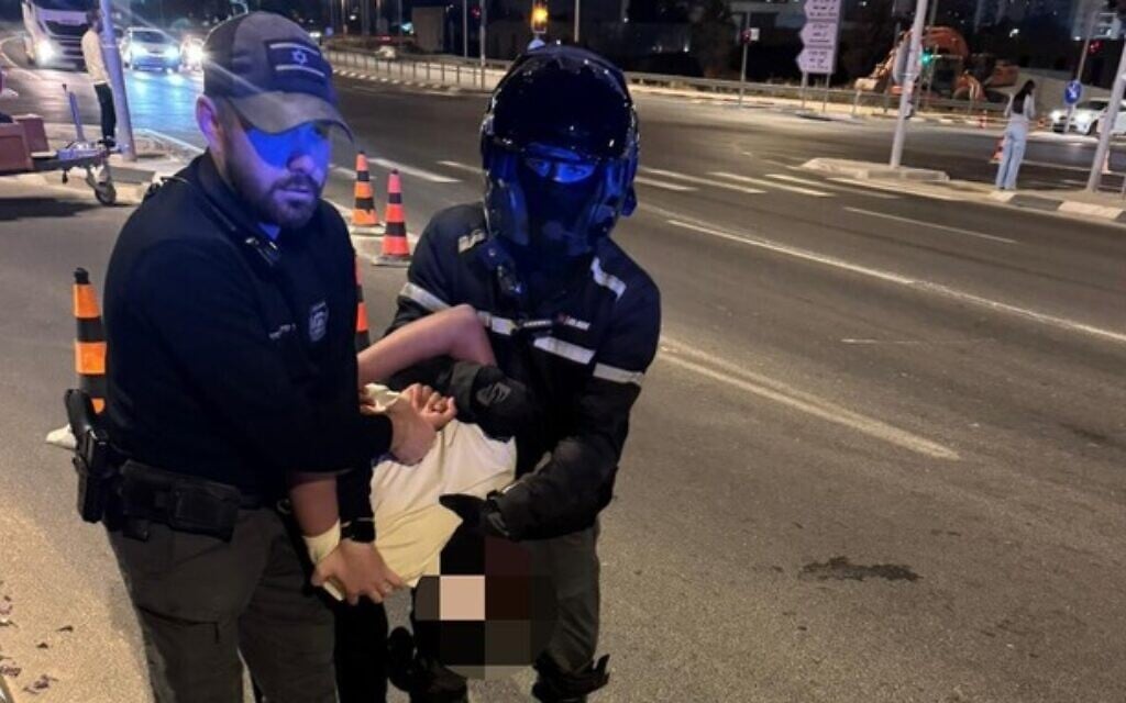 Seven arrested for disrupting ceremonies, tearing down flags during ...