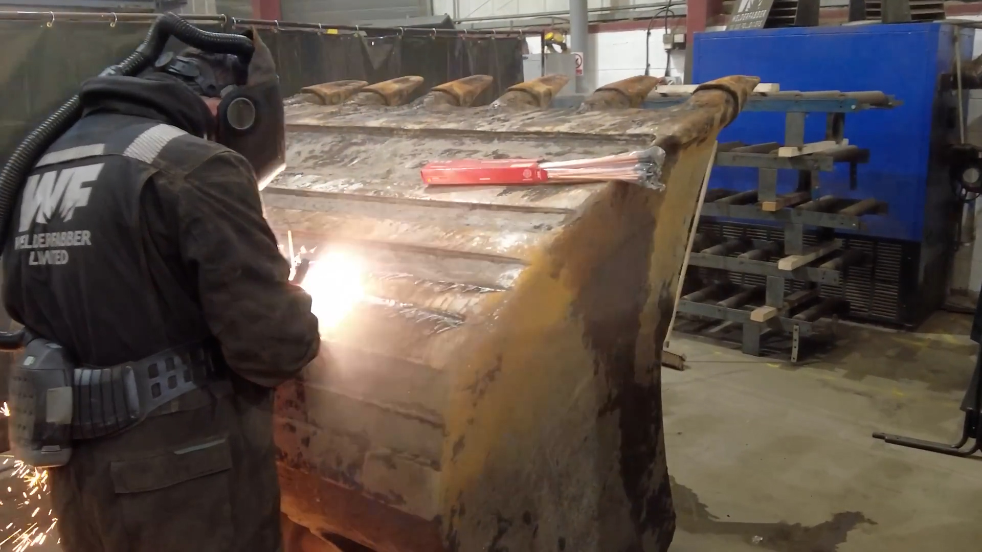 Heavy equipment bucket welding and surface repair