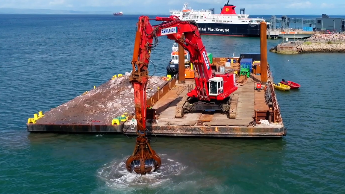 This giant floating excavator digs deep beneath the waves