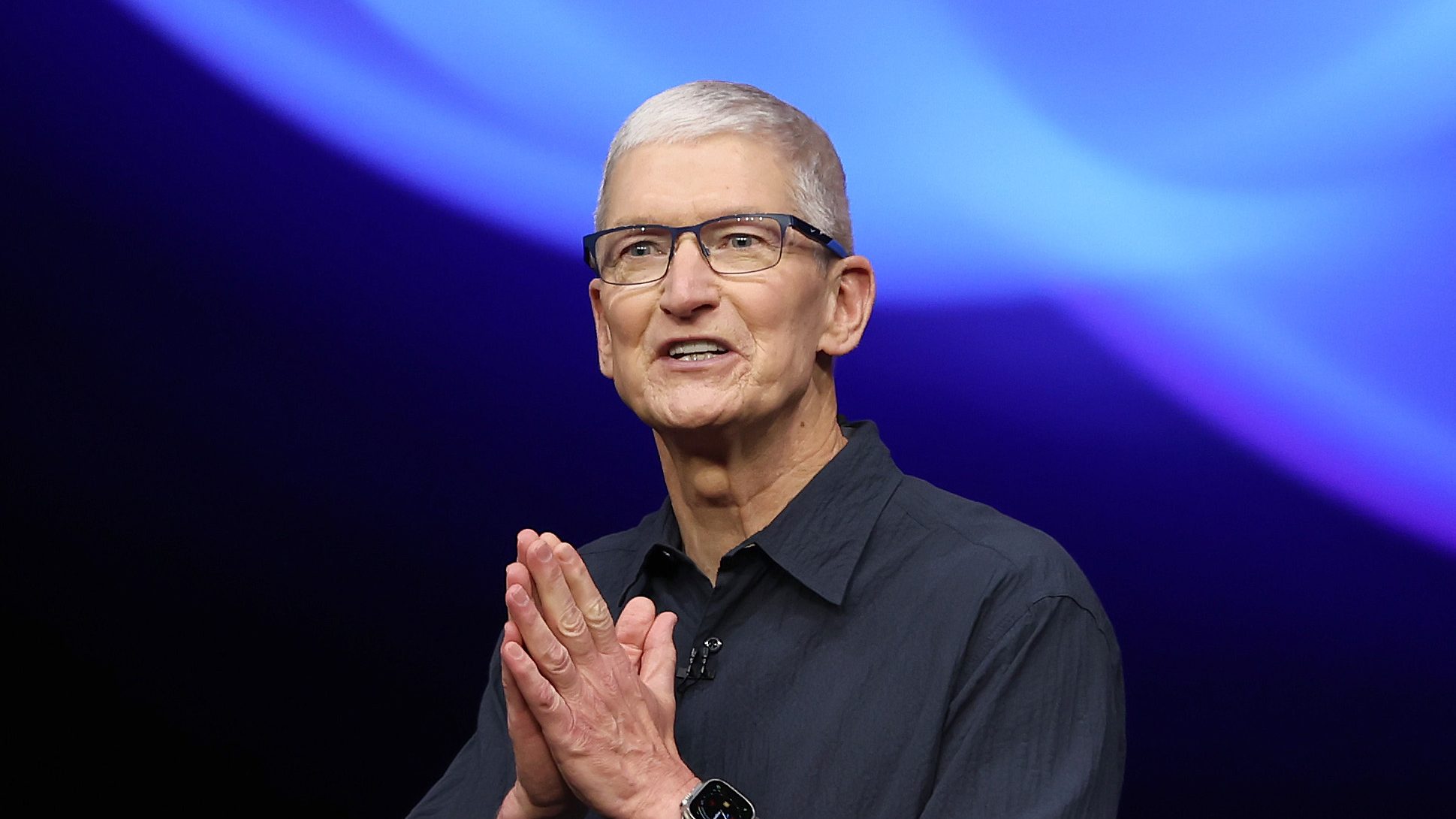 Why is Tim Cook stepping down as the CEO of Apple?