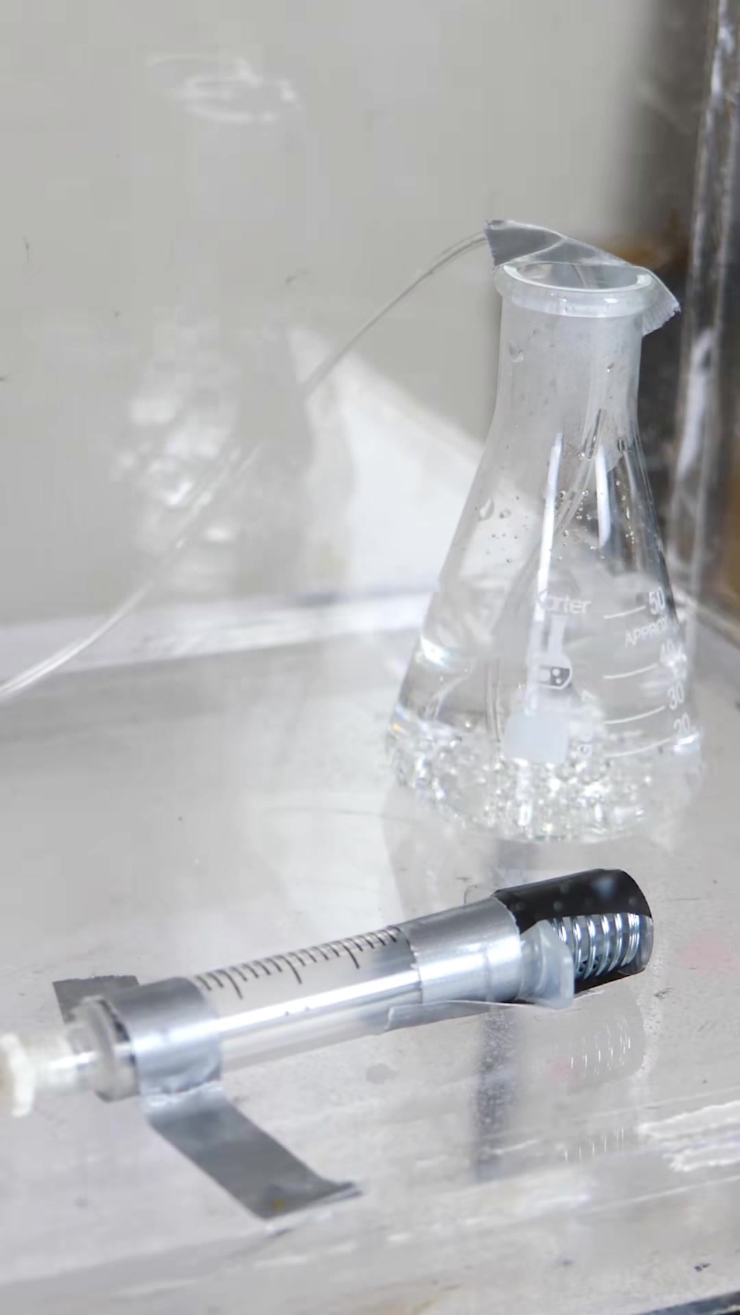 Does a syringe work in a vacuum?