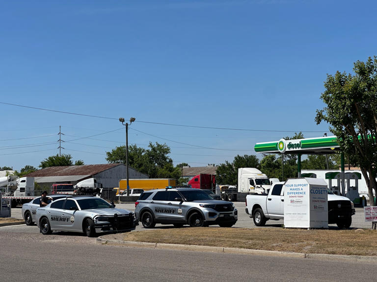 Mother charged after child shot outside Gordon Highway BP, deputies say