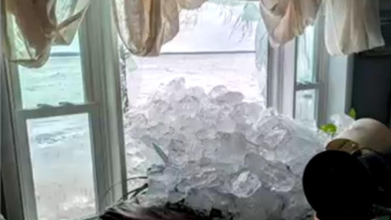 Slow-moving monster storm hammers Michigan, dubbed "ice tsunami"