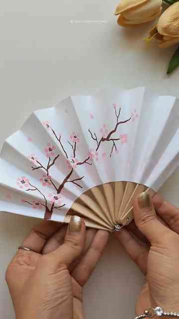 DIY popsicle stick fan with cherry blossom design easy craft idea