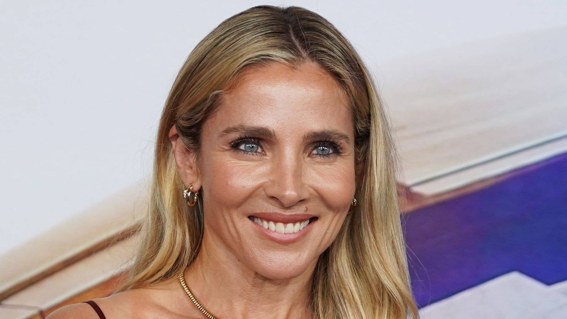 Elsa Pataky showcases her buff physique in tight silver mini dress on ...