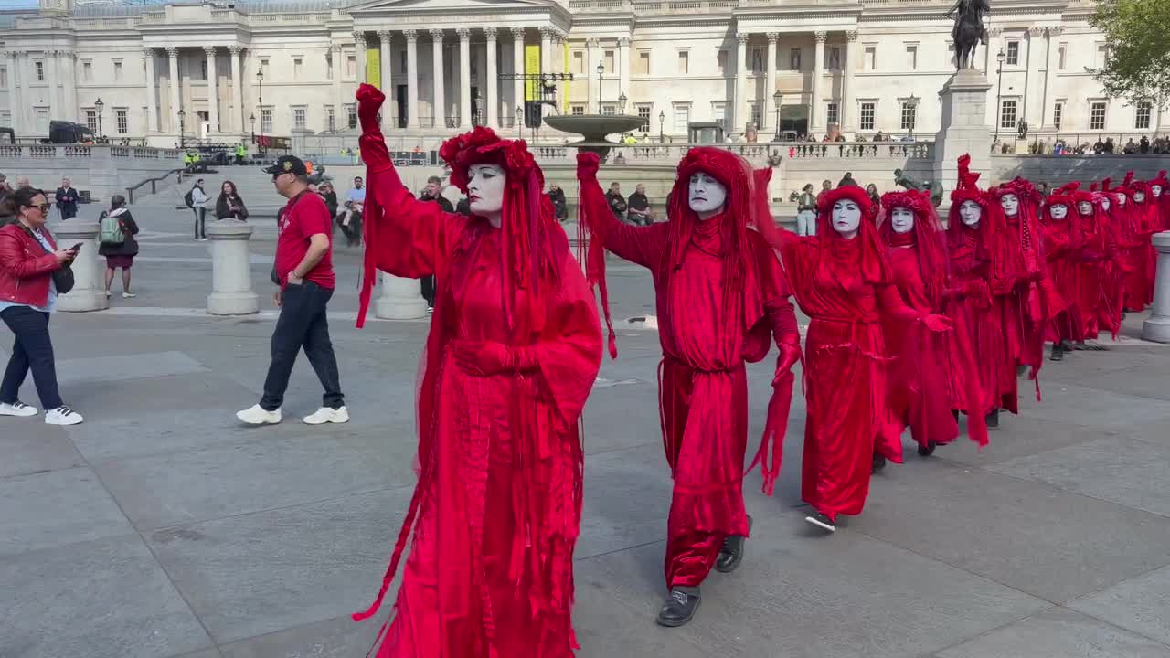 Extinction Rebellion’s Red Rebels march on Earth Day in London