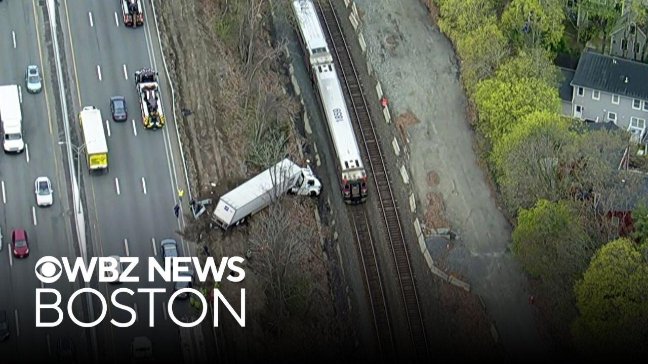 Tractor-trailer crashes through Mass Pike guardrail near MBTA Commuter ...