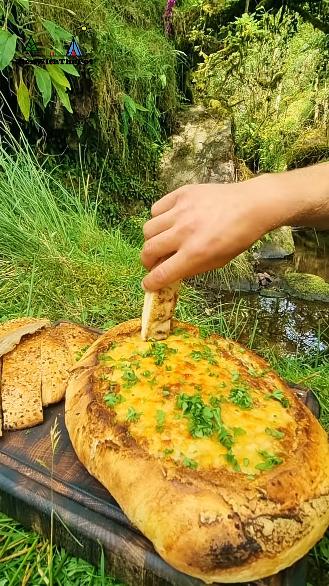 Watch how this bread boat gets covered in melted cheese in the forest