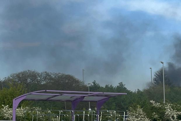 Car fire causing severe delays on M27