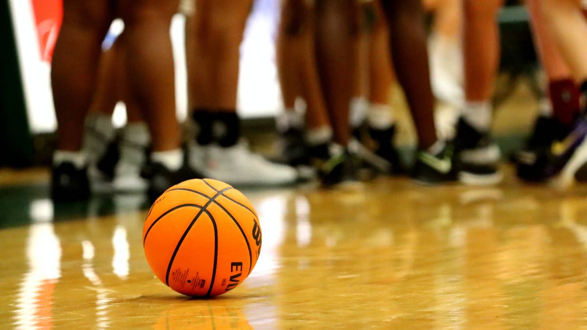 Boys basketball head coach resigns after 'pressures' from people in ...