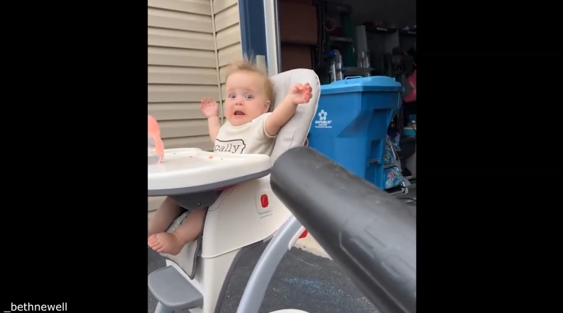 Baby learns what wind is