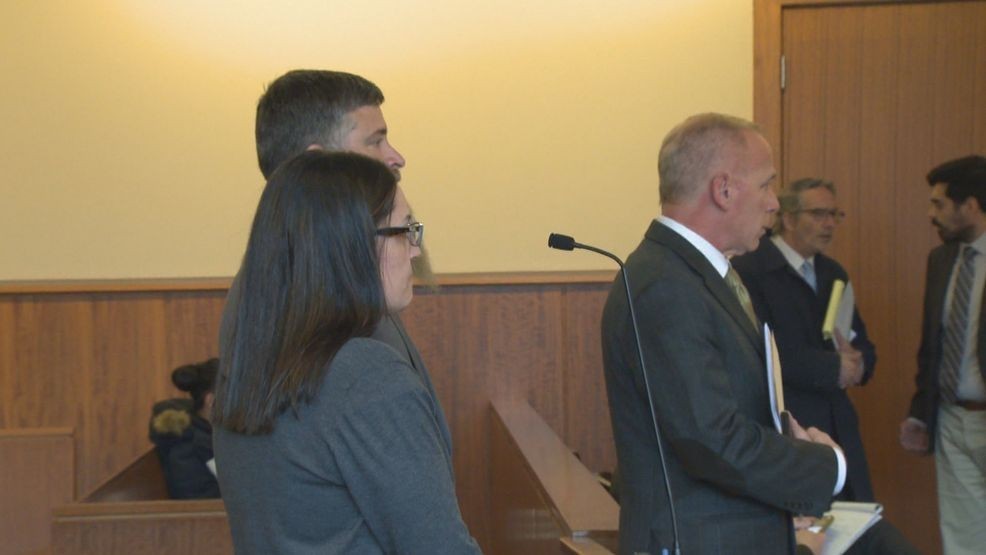 Parents of student who reportedly brought gun to school face judge on ...