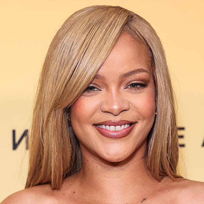 Rihanna poses with her baby girl Rocki for 'W Magazine' cover