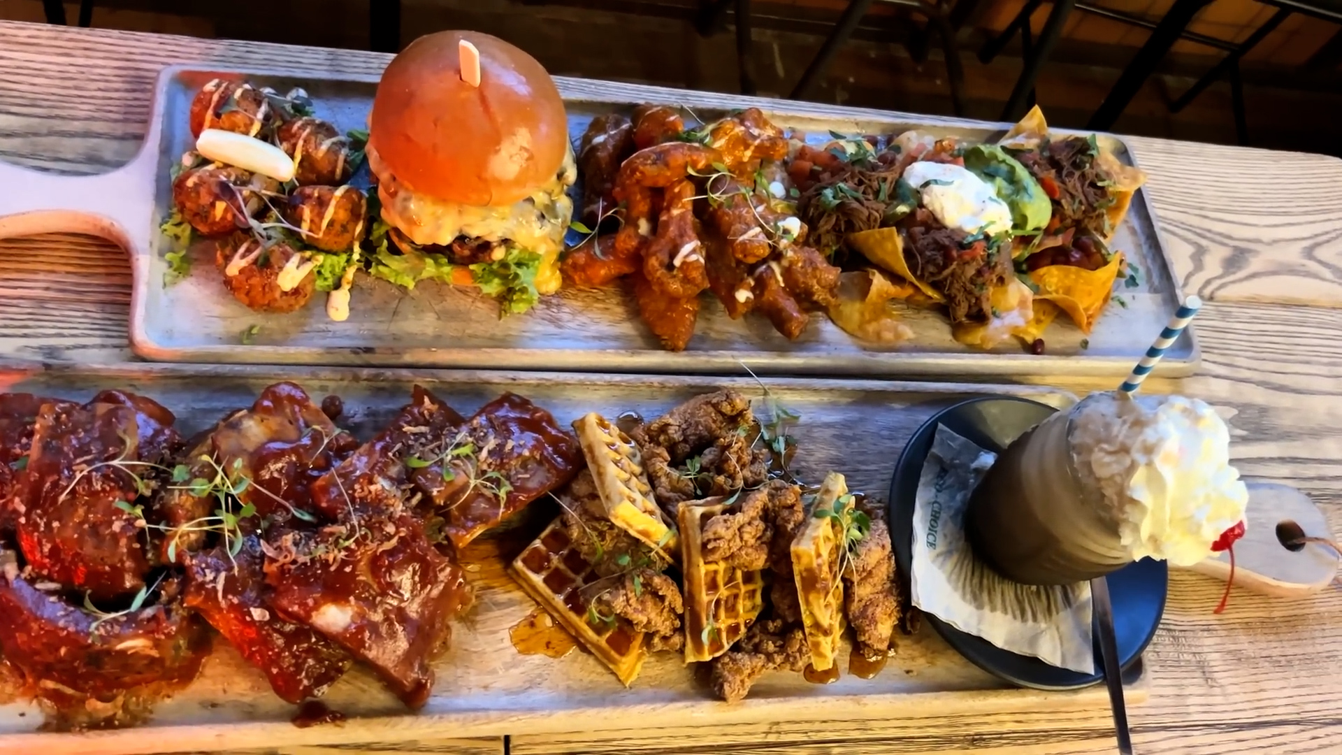 Woman attempts impossible burger, wings, and ribs food challenge