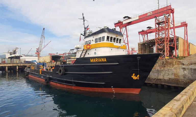 Body found, 5 crew members still missing after US cargo ship overturns