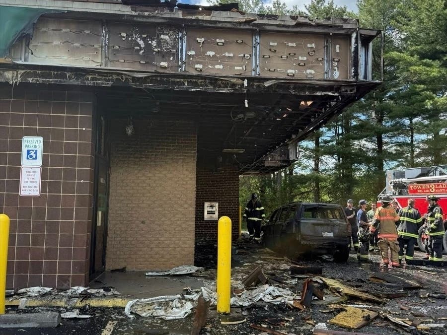 Vehicle in bank drive-thru catches on fire, spreads to building