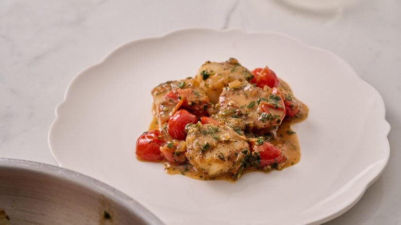 Classic garlicky scallops Provencal recipe