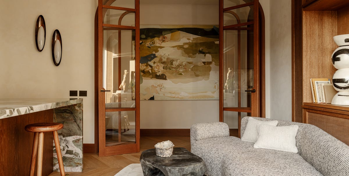 Una casa de 100 metros con las puertas de madera y cristal más bonitas ...