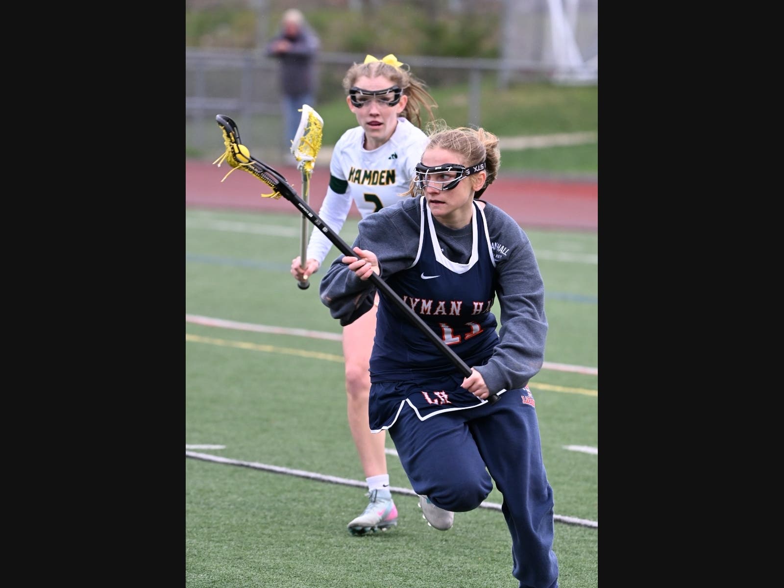 Lyman Hall girls lacrosse edges Hamden: Photos