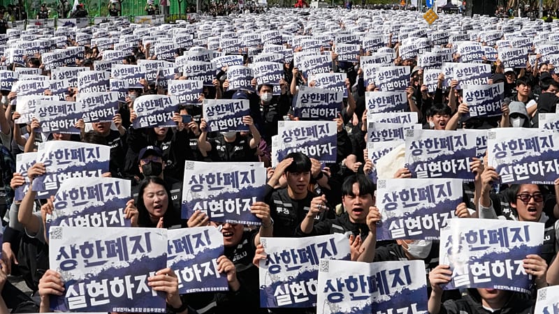 Samsung employees protest and threaten strike, demanding share of ...