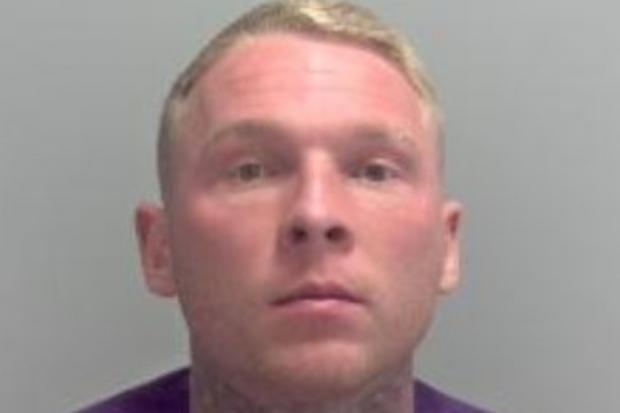 Man wanted over armed robbery in Hertfordshire
