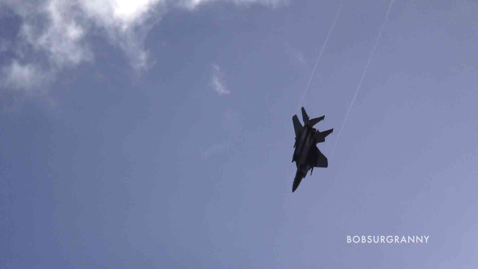 Watch the F-15E go low on takeoff - then the flyby gets uncomfortably close