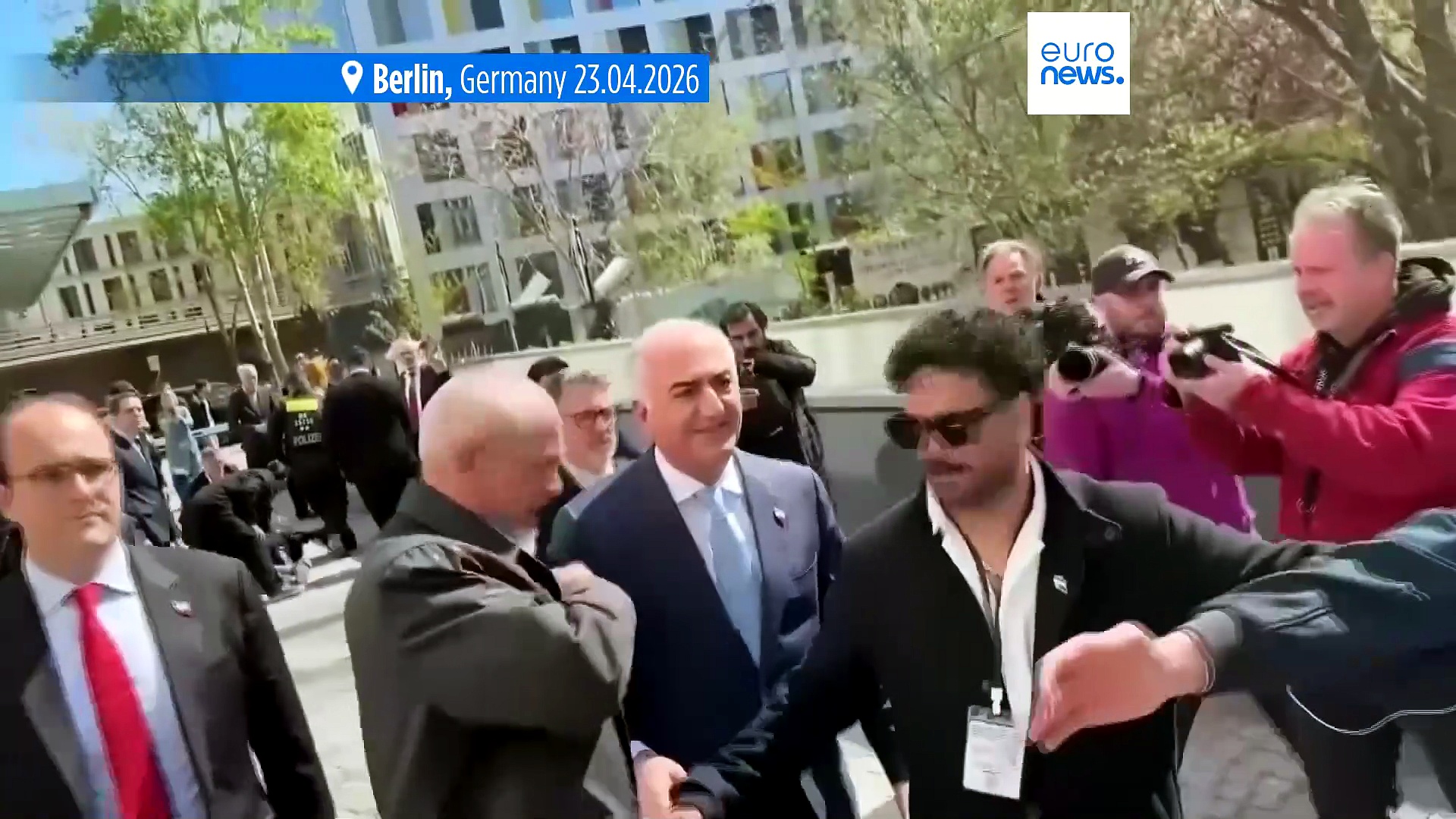 Iran's exiled crown prince Reza Pahlavi splattered with red liquid in ...
