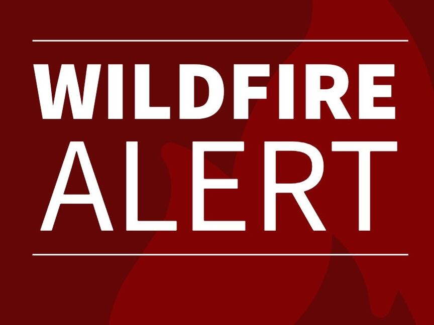Raging wildfire threatens homes in Hermosa