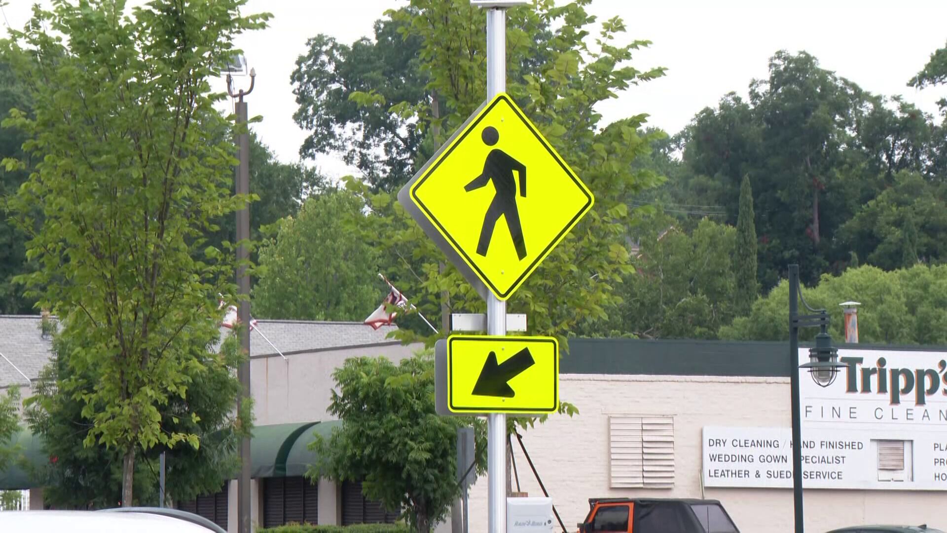 Woman claims 'negligent design' of crosswalk led to Five Points hit-and-run