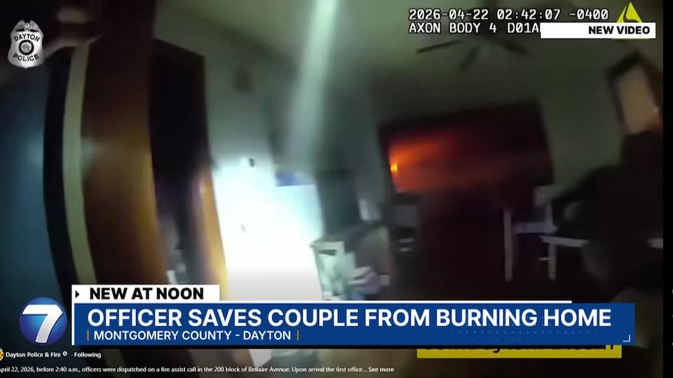 Police assist couple from house fire in Dayton neighborhood