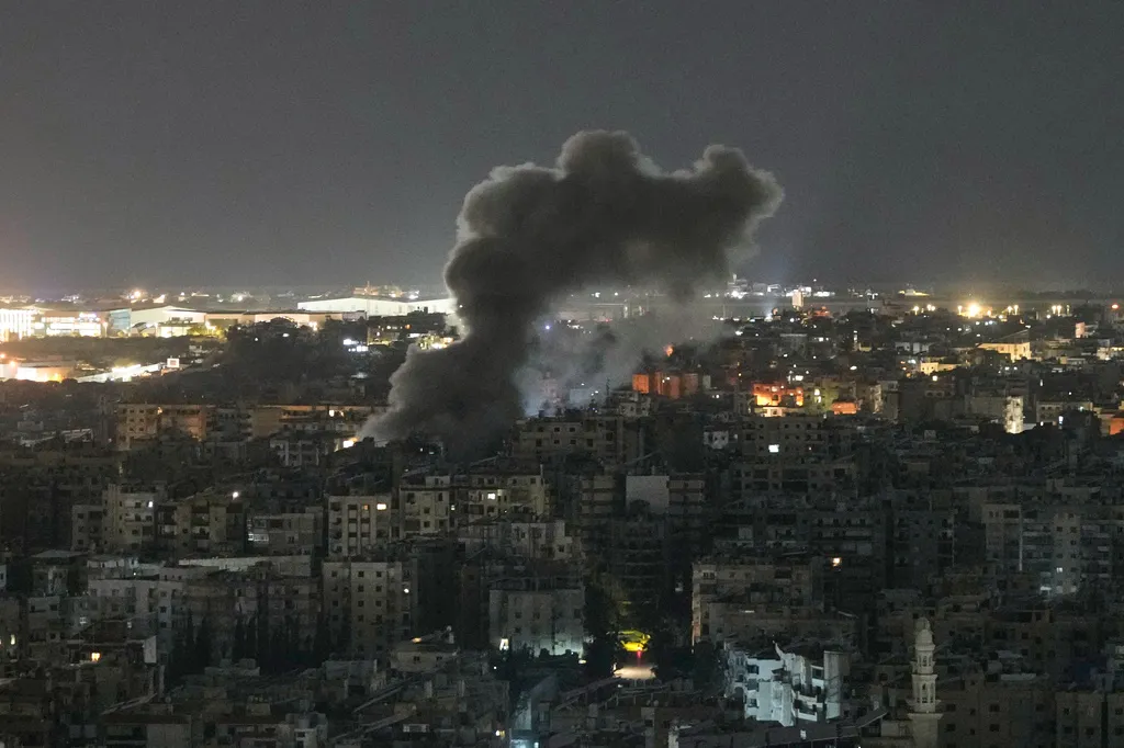 Israel targets Hezbollah commander in first strike on Beirut since ...