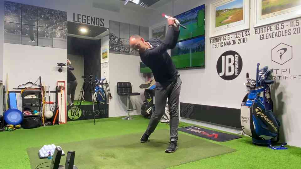 Why great golfers do this – cover the ball at impact