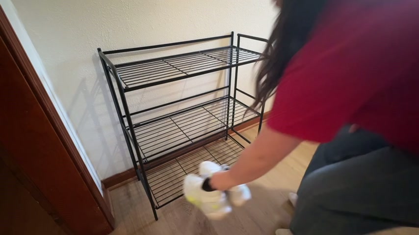 Stick a Walmart tension rod under a bench (this is genius!)