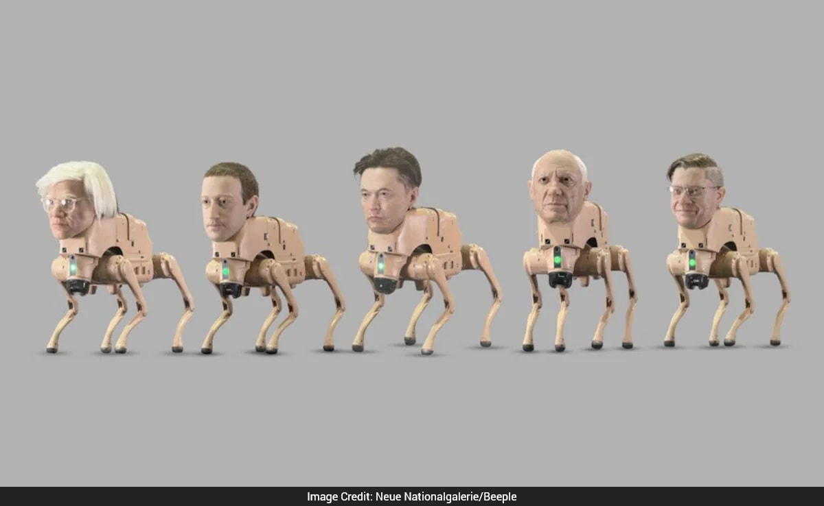 Robot dogs wearing Musk, Zuckerberg masks 'poop' printed images in ...