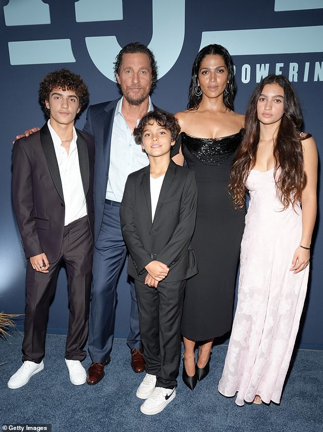 Matthew McConaughey, 56, is seen in a rare photo with his mini-me children