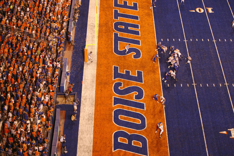 Saints coach Kellen Moore honored at Boise State's iconic blue field