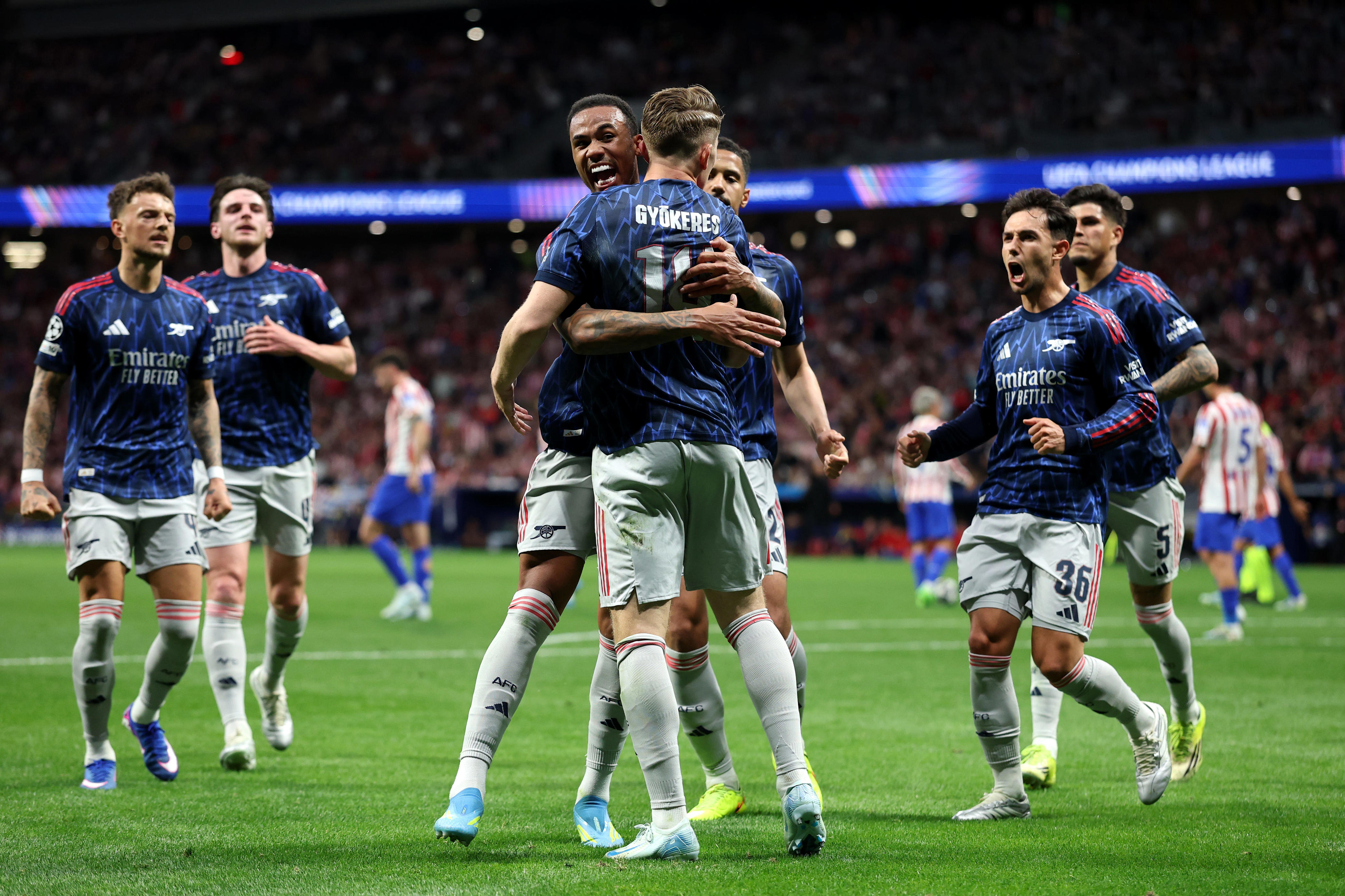 Arsenal and Atletico Madrid fight out Champions League draw amid ...