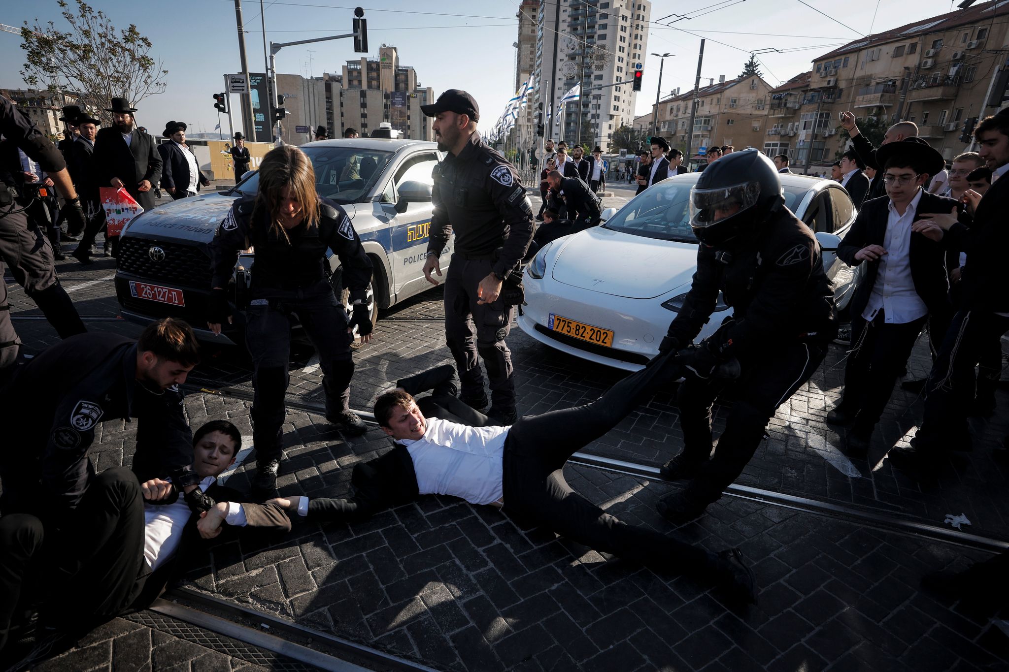 Israeli ultra-Orthodox protest draft, clash with police