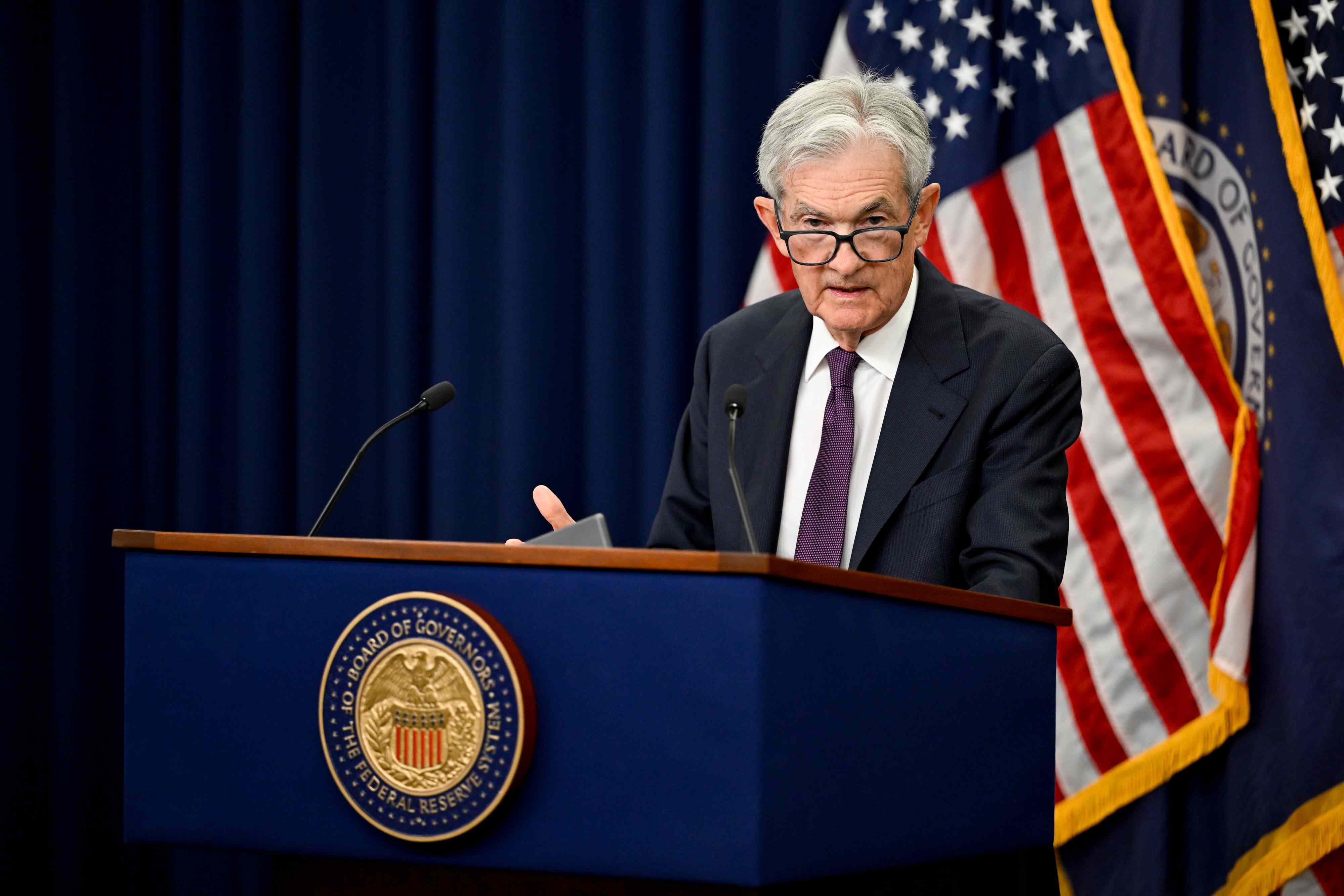 Fed holds interest rates steady as Iran war stokes inflation and clouds ...