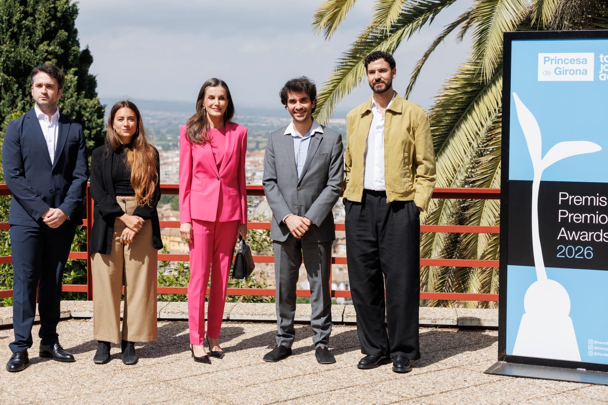 Queen Letizia steps out in a vibrant Hugo Boss pantsuit for a Spanish ...