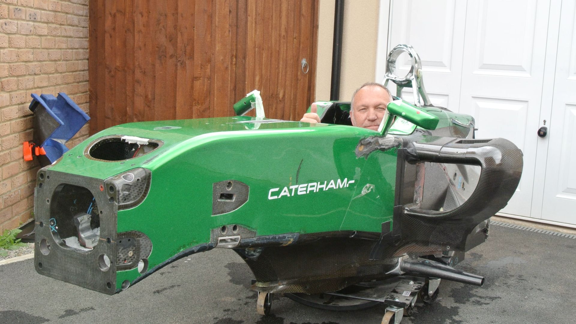 Photos: Electrician reconstructs crashed Formula 1 car wreckage into ...