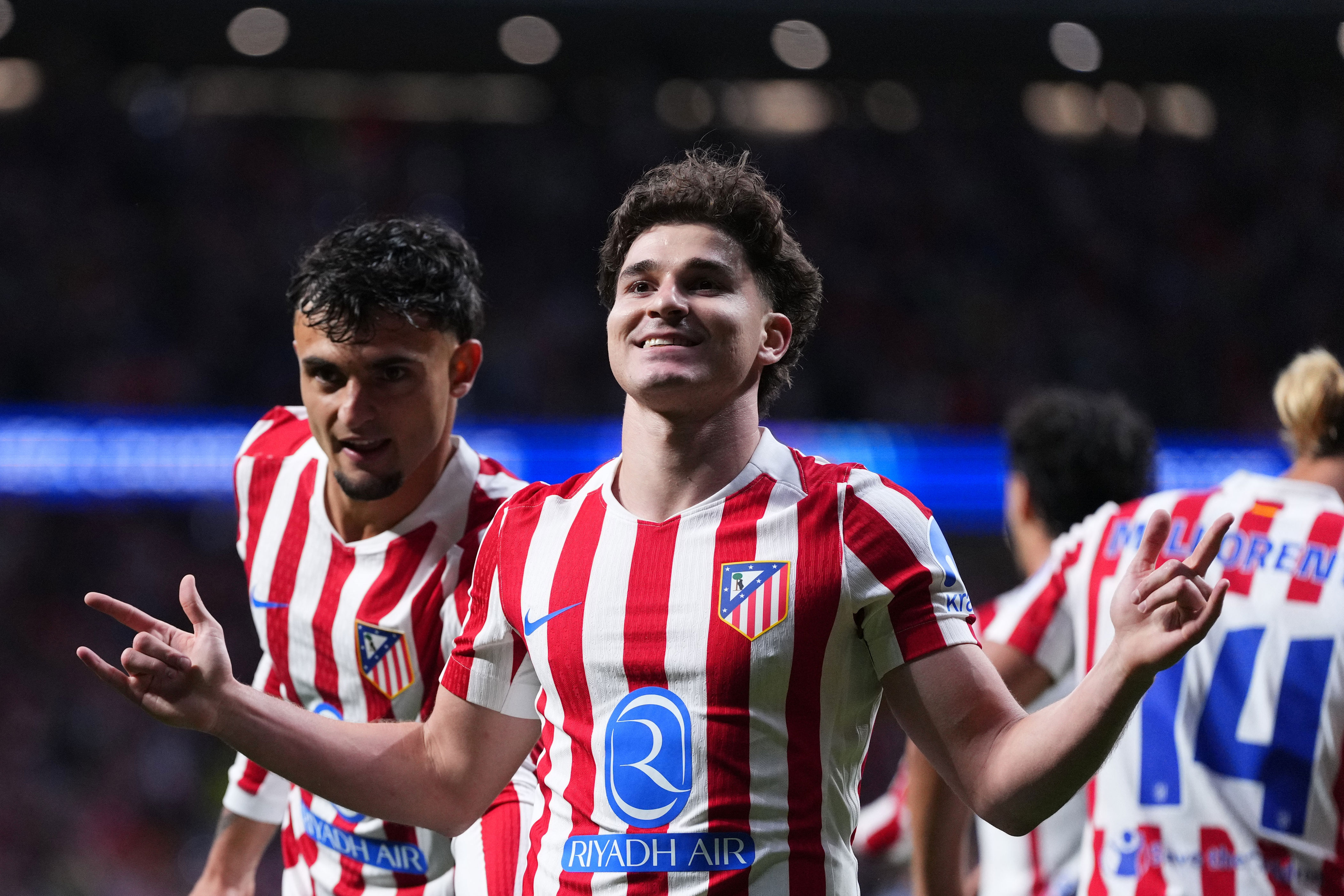 Arsenal and Atletico exchange penalty goals in 1-1 draw in 1st leg of ...