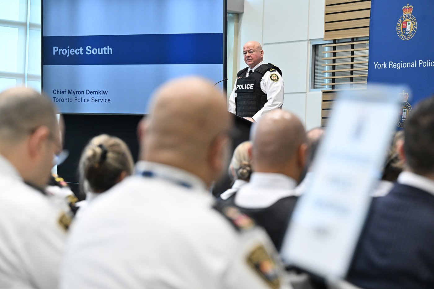 Toronto cop accused in corruption probe to stay behind bars after review